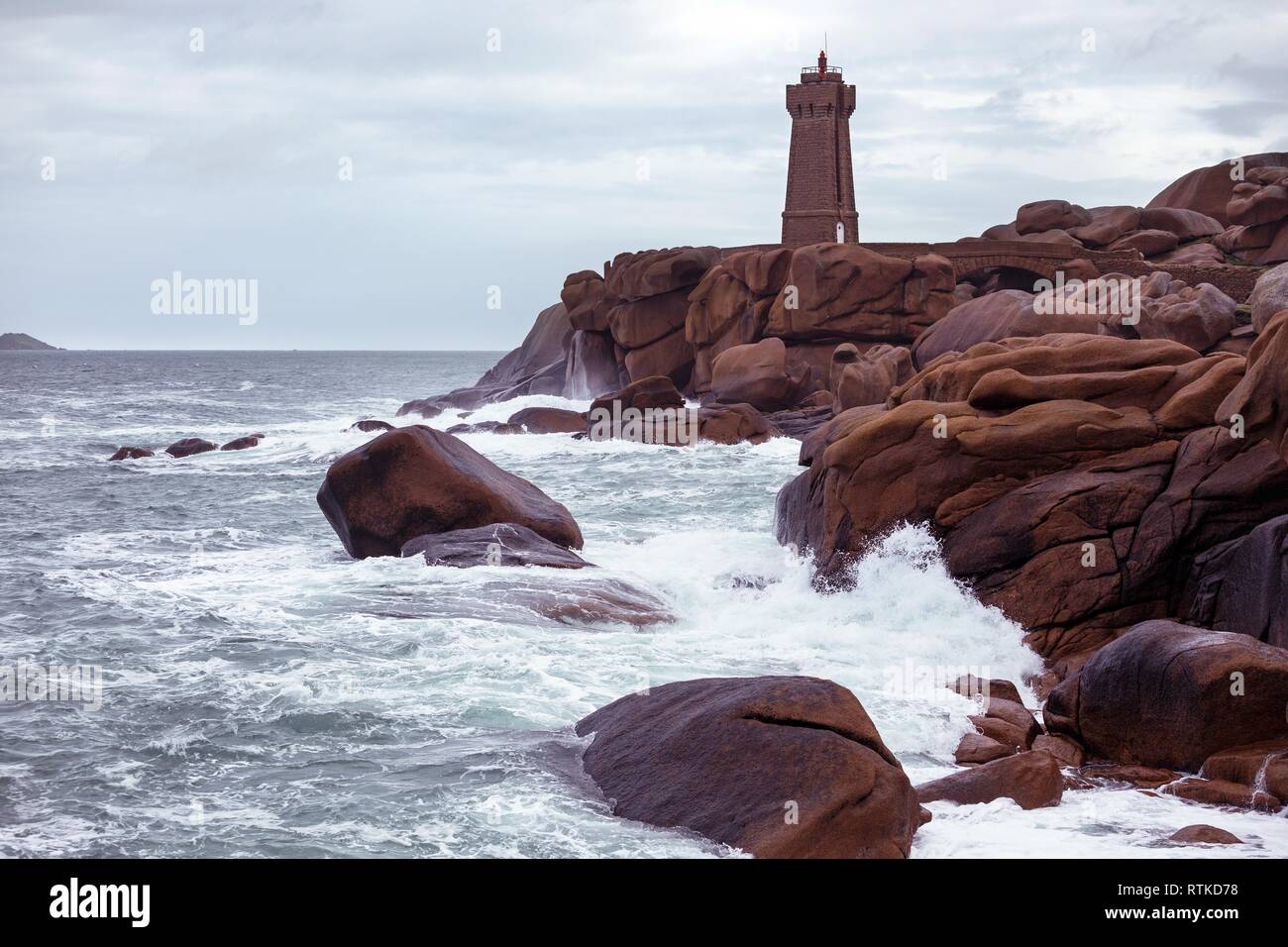 lighthouse Phare de Men Ruz and typical Brittany coast at the Tregastel ...