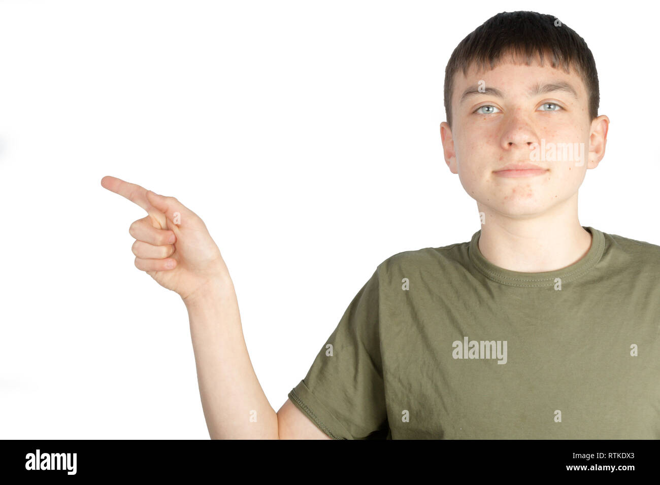 Caucasian teenage boy doing American Sign Language on one hand showing ...