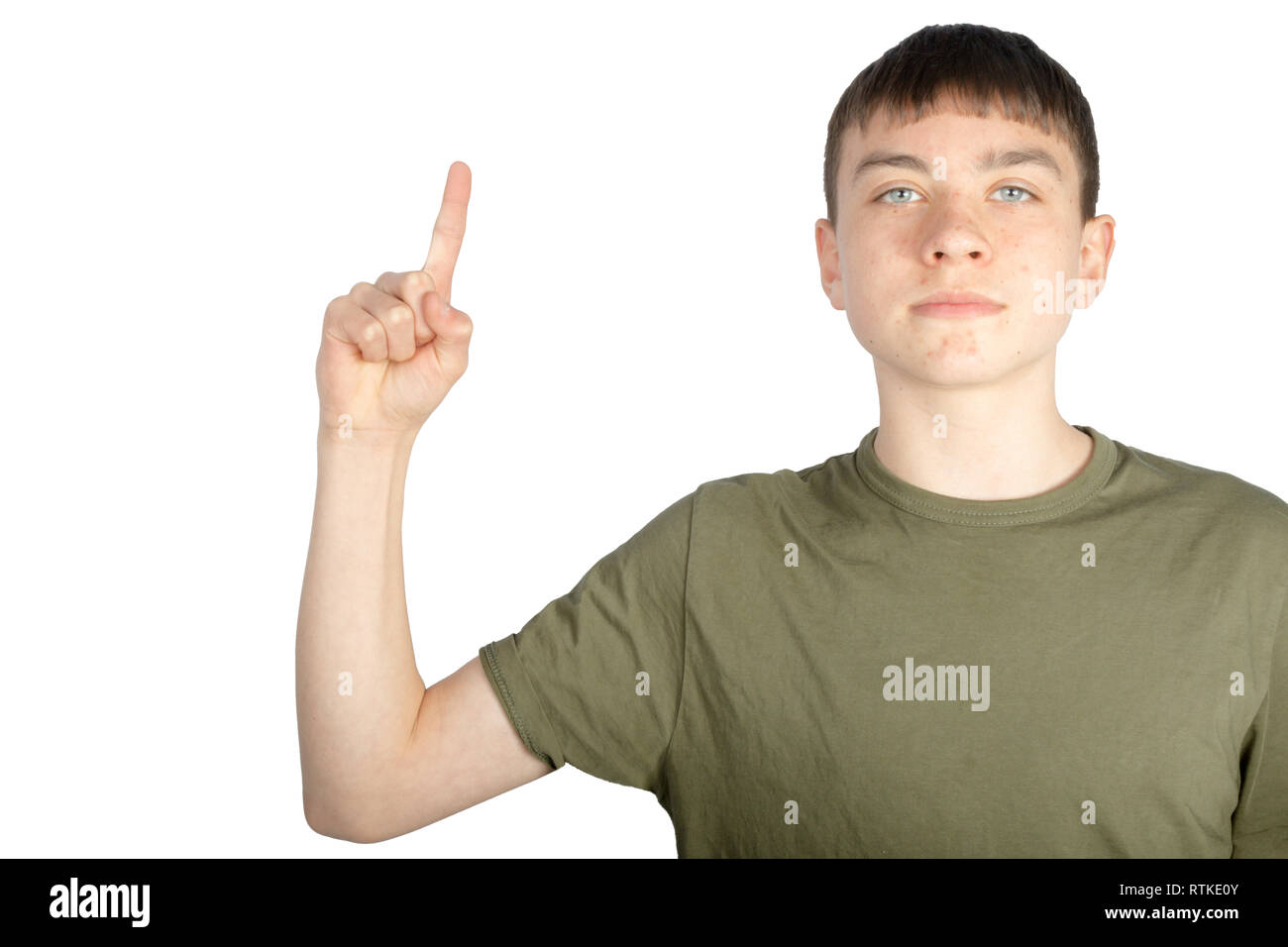 Caucasian teenage boy doing American Sign Language on one hand showing ...