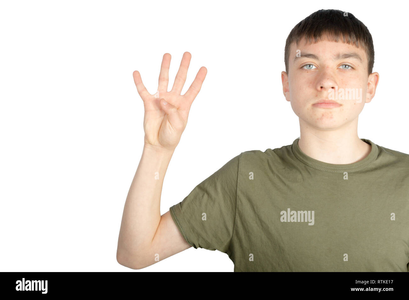 Caucasian teenage boy doing American Sign Language on one hand showing ...