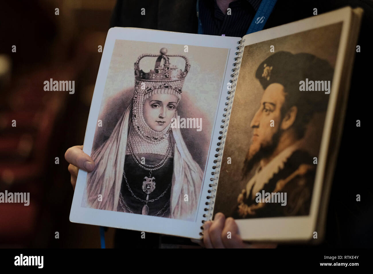 A person holds a book with images of members of the noble Polish ...