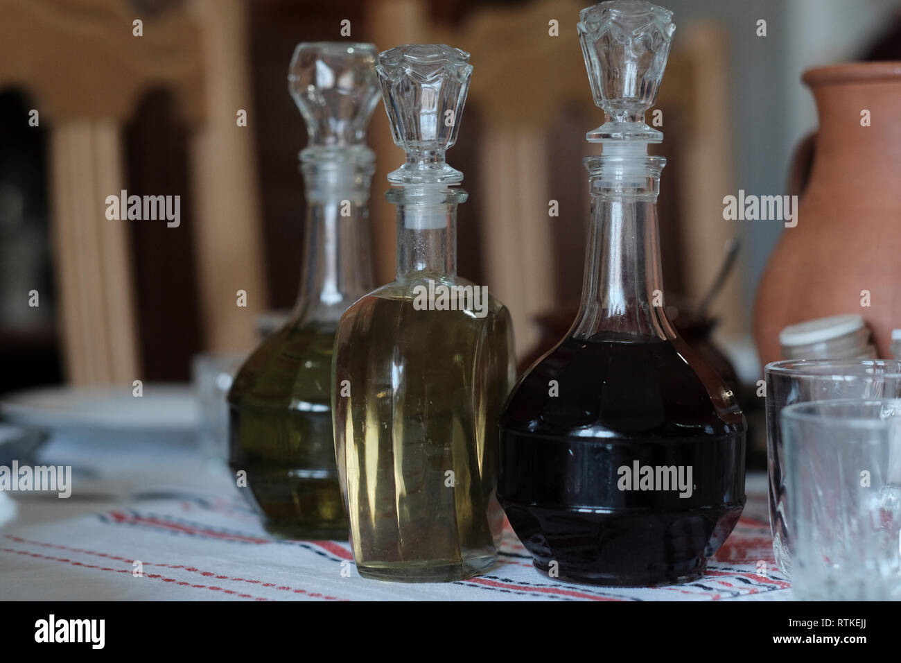 Bottles of homemade Samogon distilled alcoholic beverage during a ...