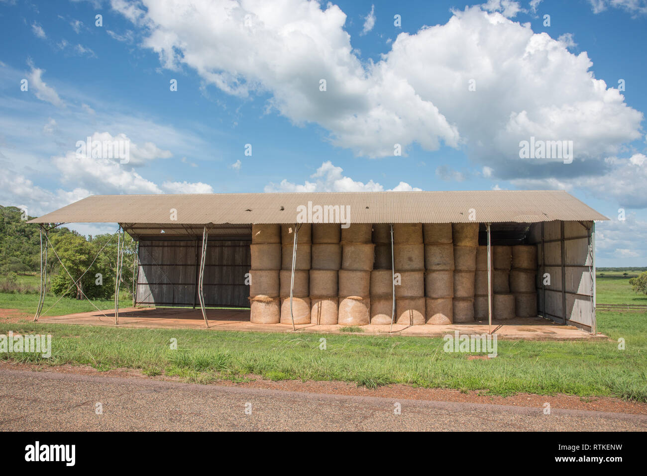 Hay bales under built farmland structure in rural Middle Point ...