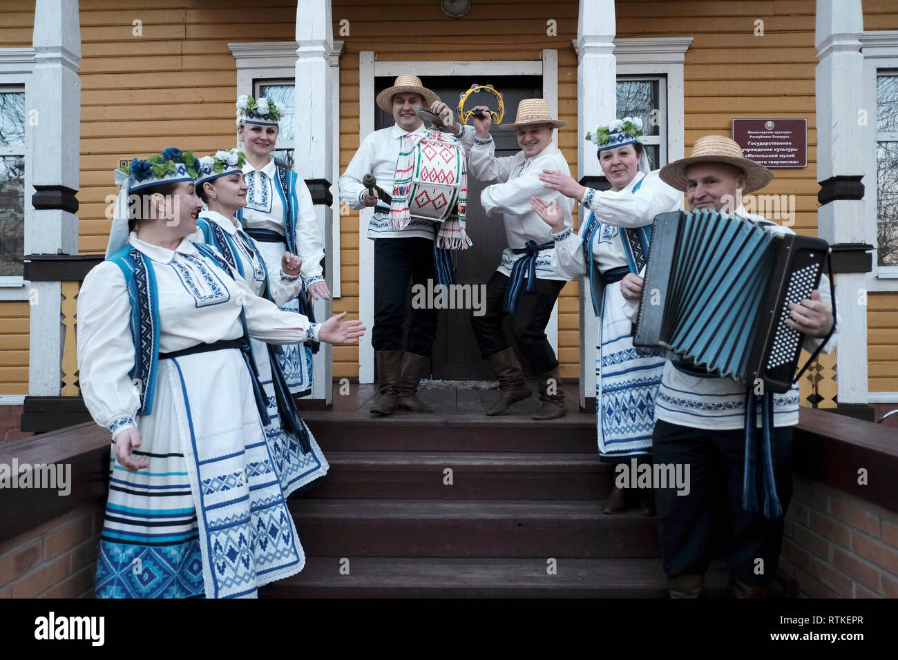 Belarusian folklore band in traditional garment singing folk songs at ...