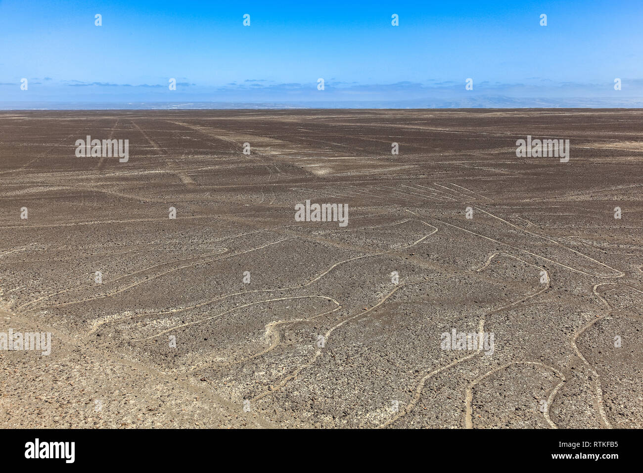 From a tower you can see some straight nazca lines that extend to the ...