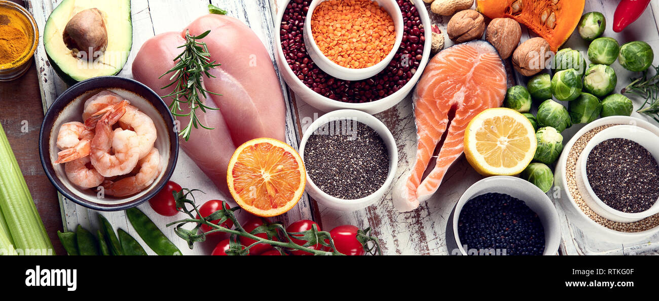 Healthy food: chicken meat, fish, seafood, fresh vegetables, fruits ...