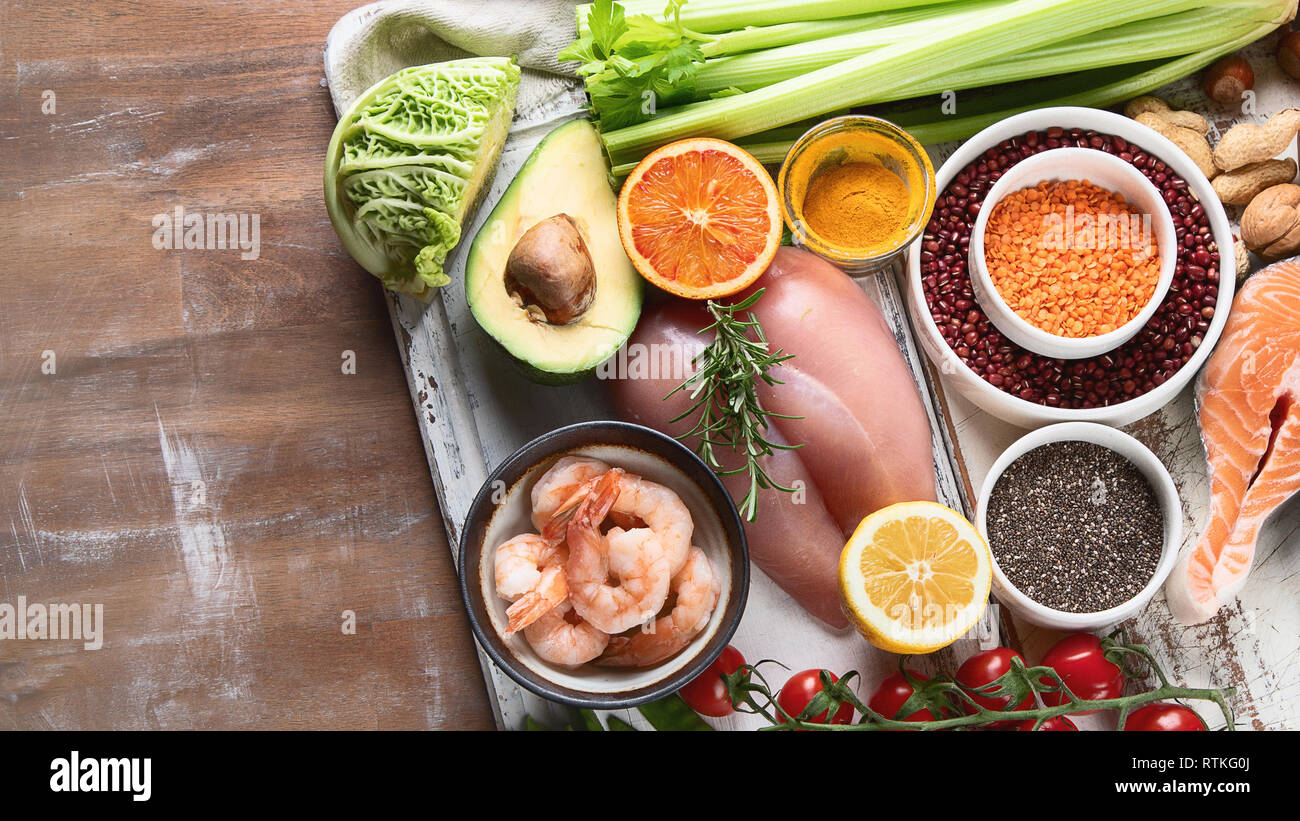 Healthy food: chicken meat, fish, seafood, fresh vegetables, fruits ...