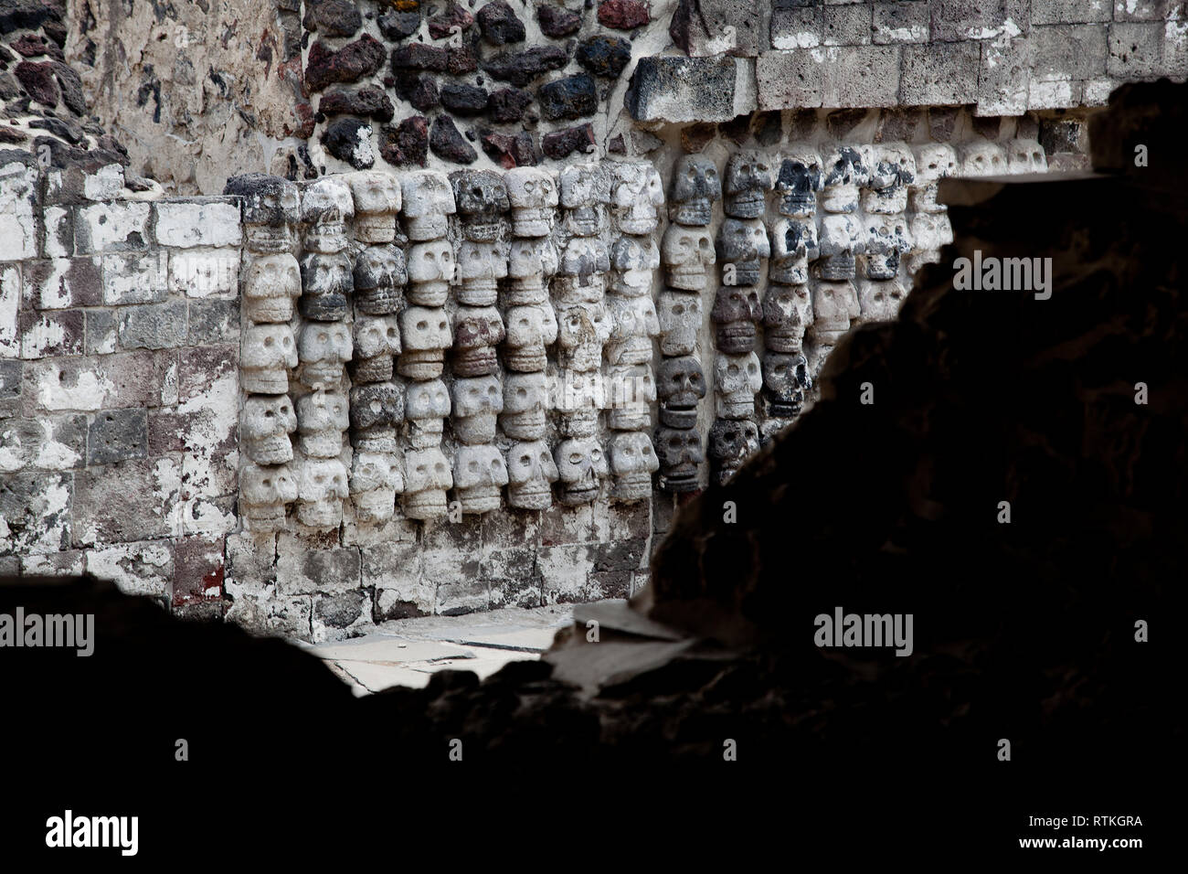 skull rack, or tzompantli sculpture at the ancient Aztec archaeological ...