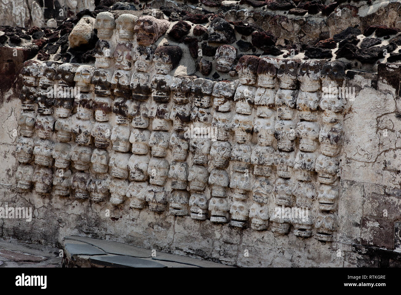 skull rack, or tzompantli sculpture at the ancient Aztec archaeological ...