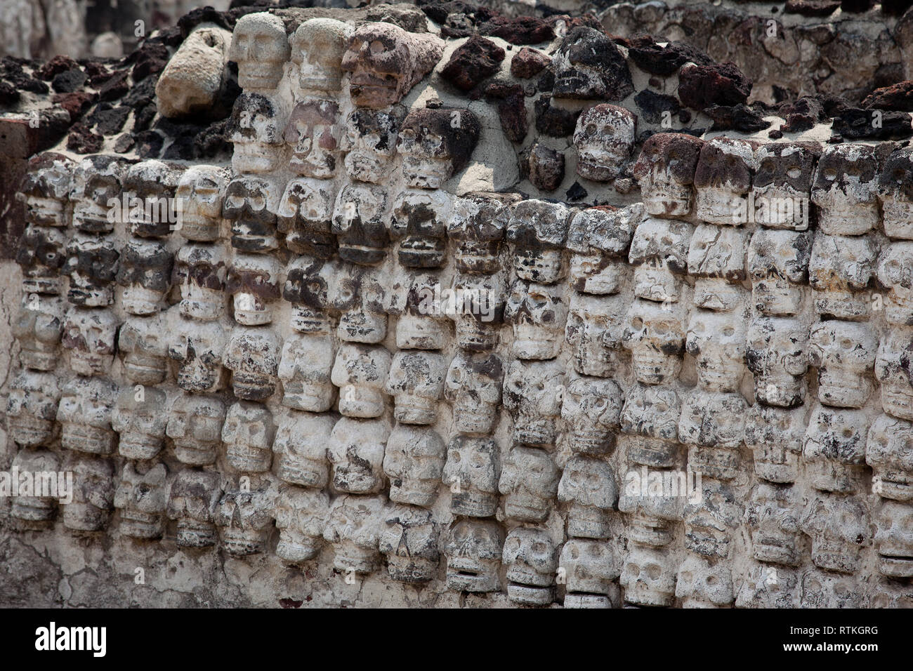 skull rack, or tzompantli sculpture at the ancient Aztec archaeological ...