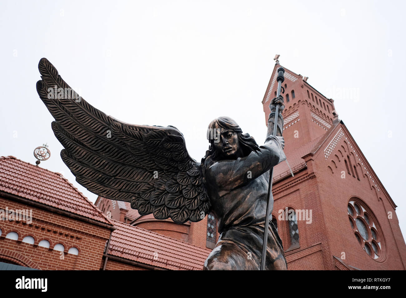 Statue of Archangel Michael with outstretched wings in front of the ...