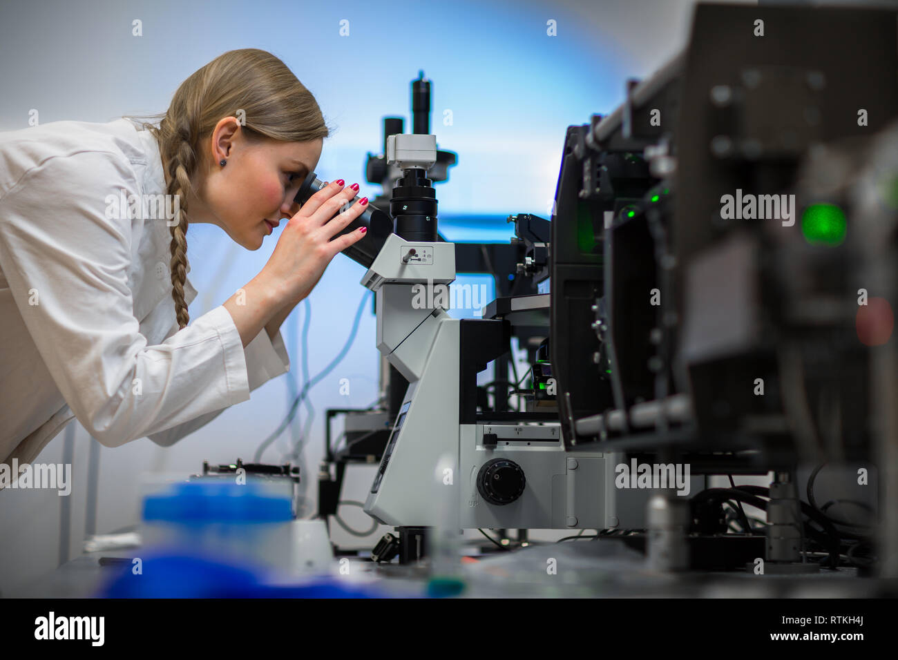Portrait of a female researcher carrying out research in a chemistry ...