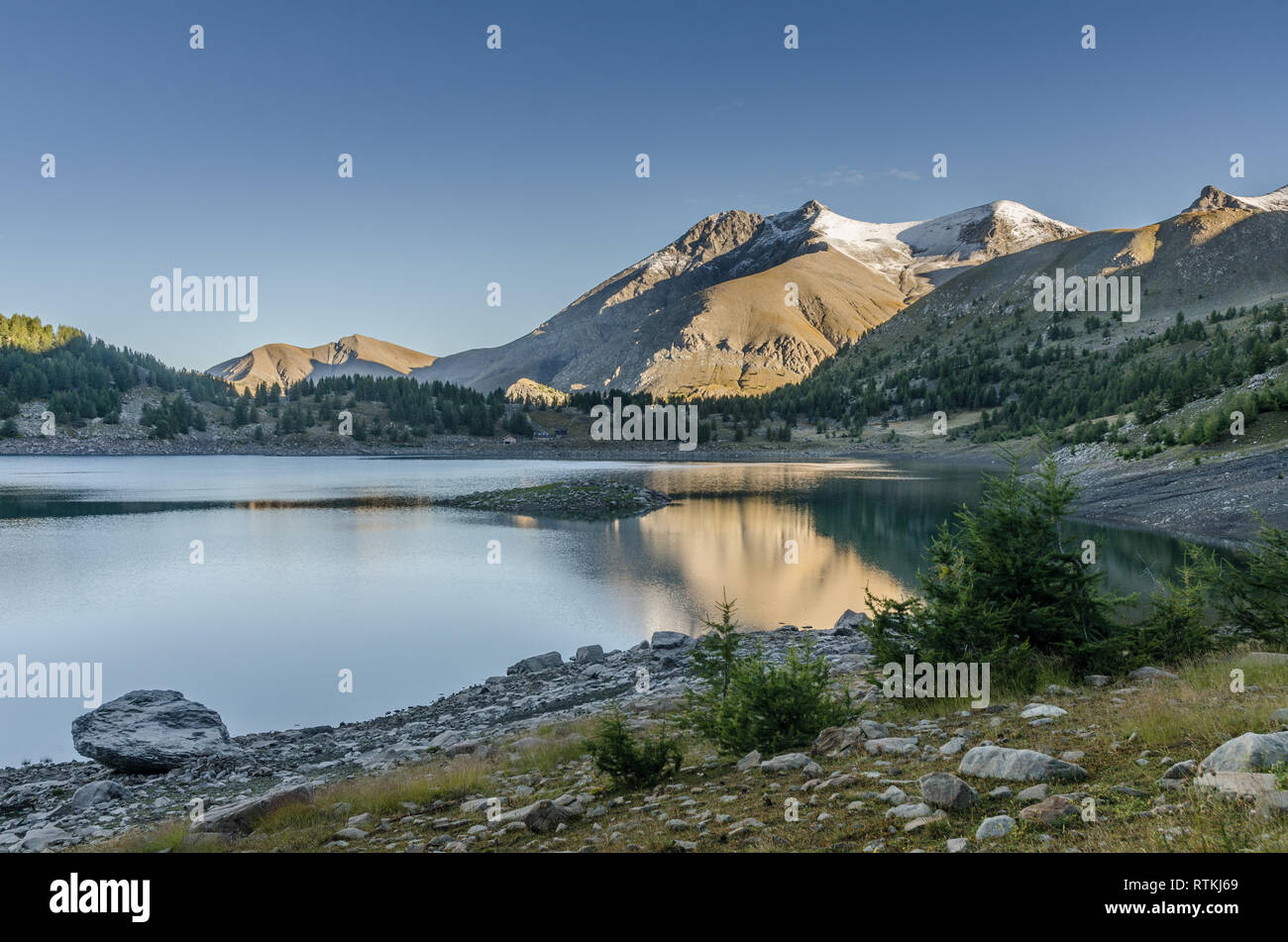 morning view of Allos lake in french alps Stock Photo - Alamy