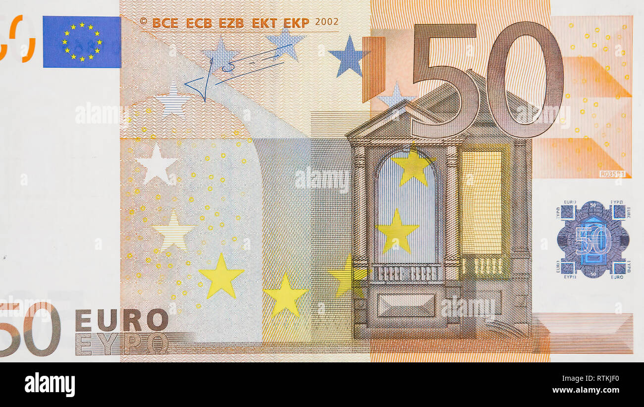 A new 50 Euro bill on the table. A bill is clearly new and stiff Stock ...