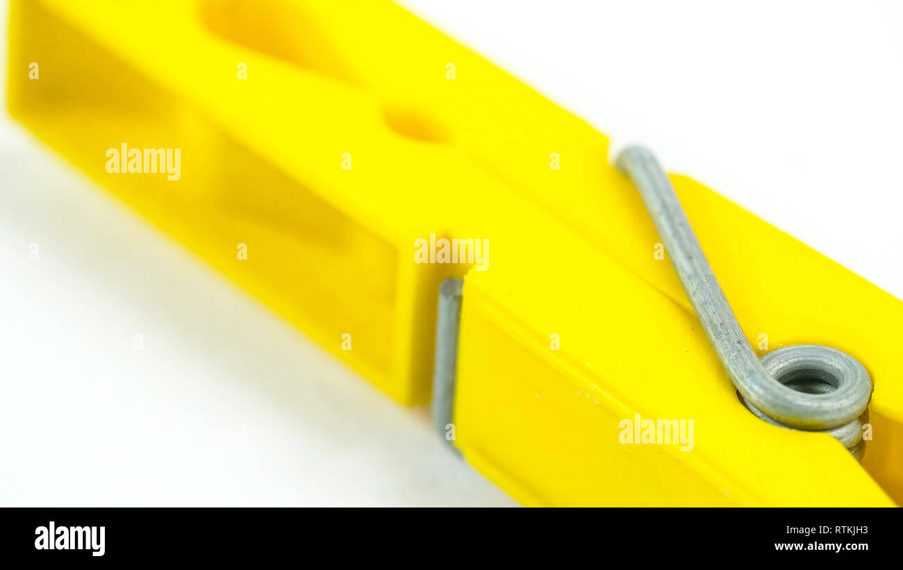 Turn around upside view of the yellow cloth clipper. The clipper is on ...