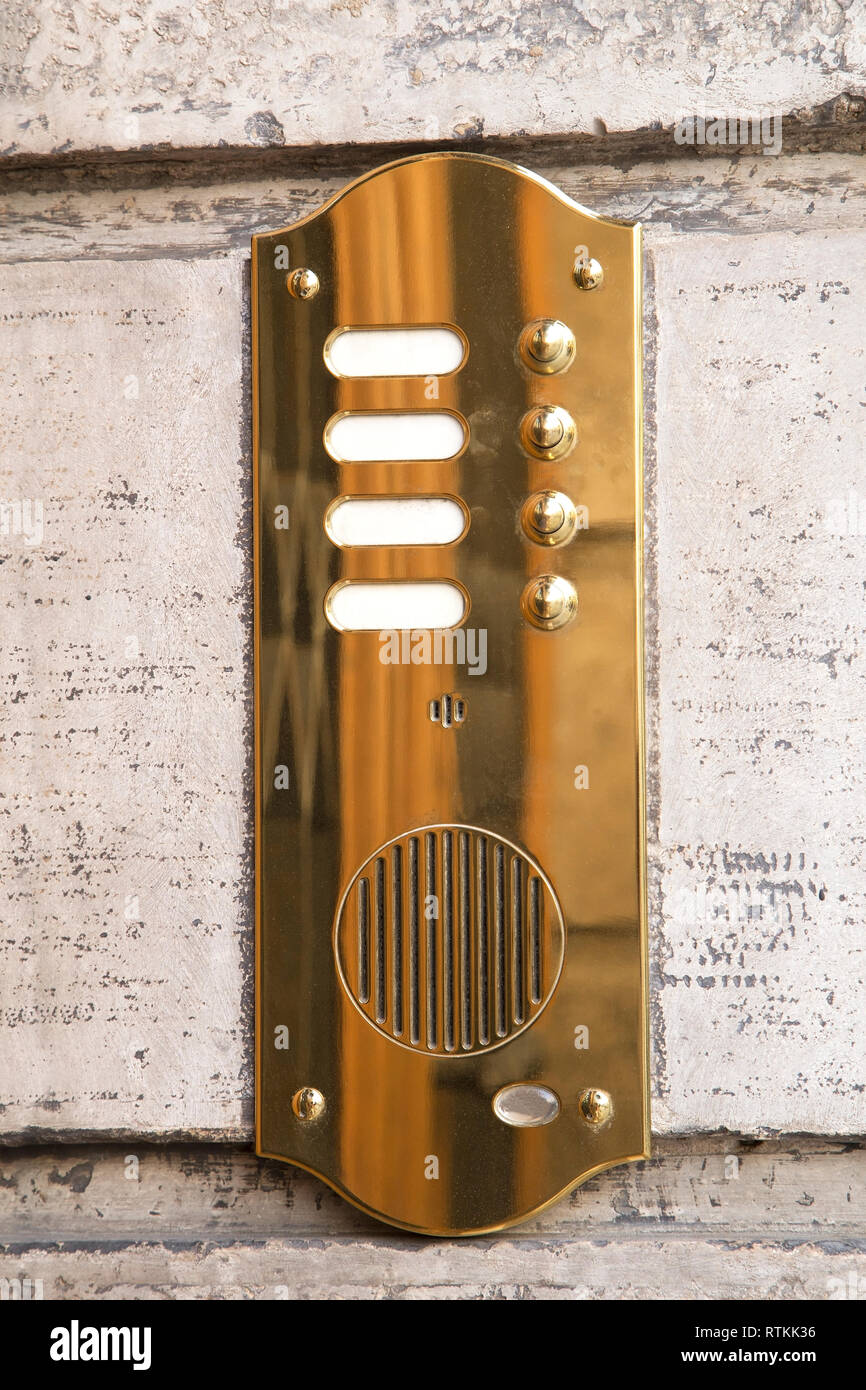 Brass intercom on marble facade Stock Photo - Alamy