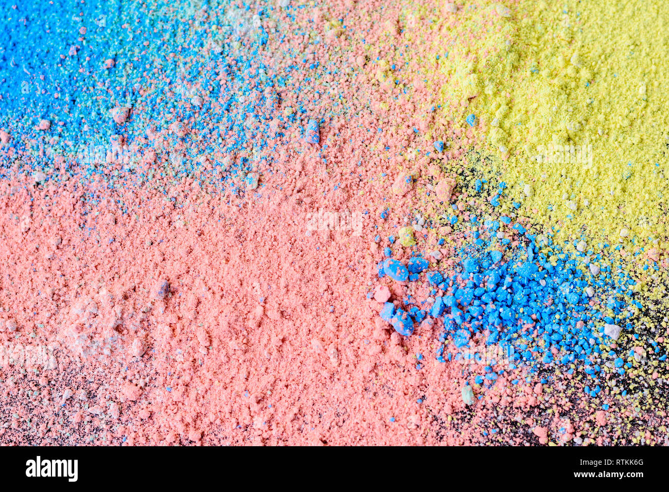 Colorful background of chalk powder. Multicolored dust particles ...