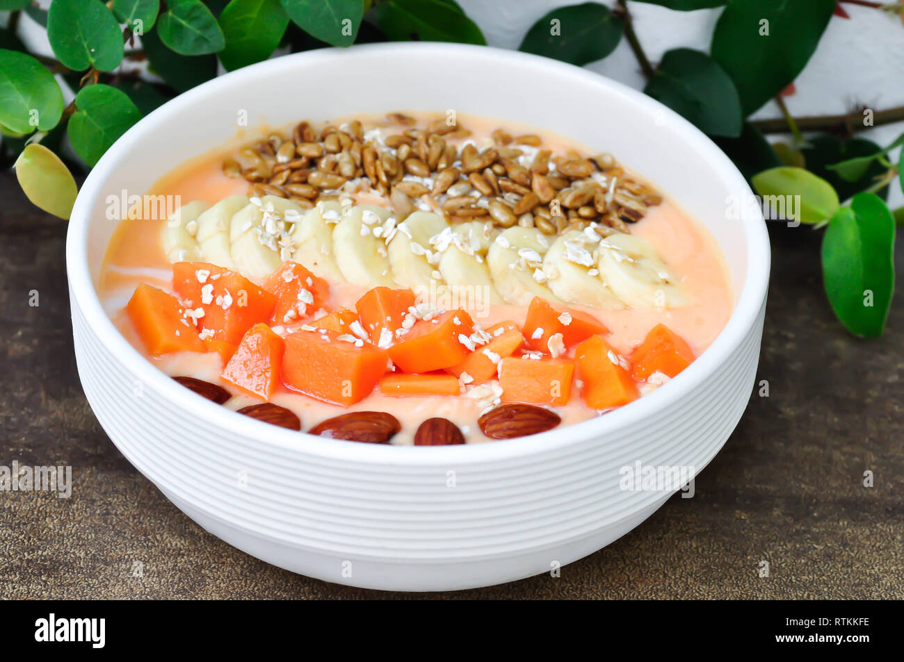 yogurt ,papaya yogurt with fruit topping Stock Photo - Alamy