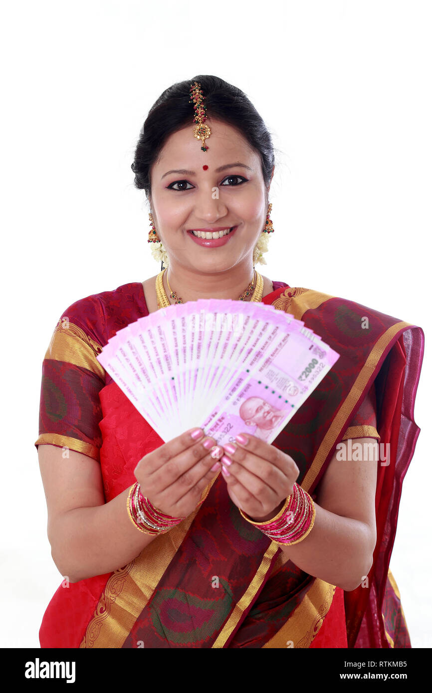 Woman holding indian paper currency hi-res stock photography and images ...