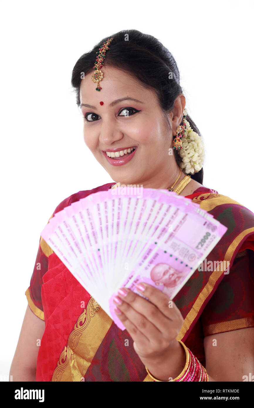 Woman holding indian paper currency hi-res stock photography and images ...