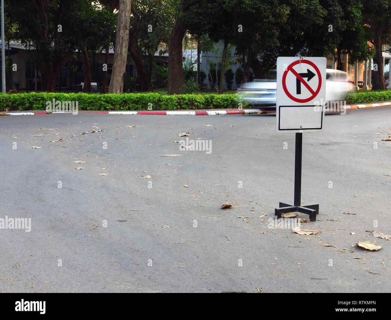 No right turn allowed sign with car in background Stock Photo - Alamy