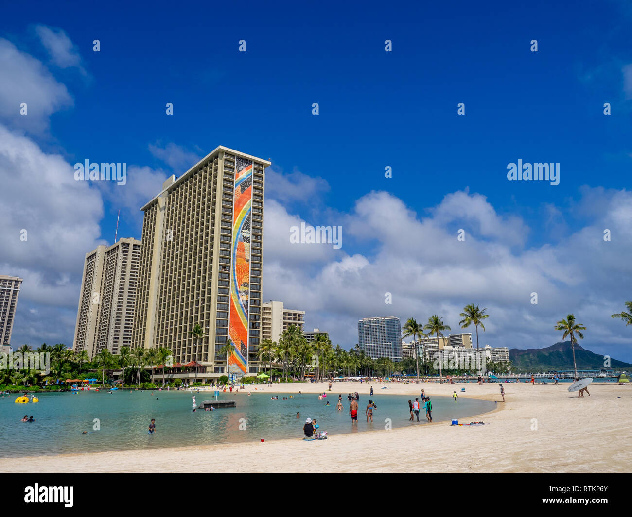 Sun lovers on Waikiki beach at the Hawaiian Hilton on August 7, 2016 in ...