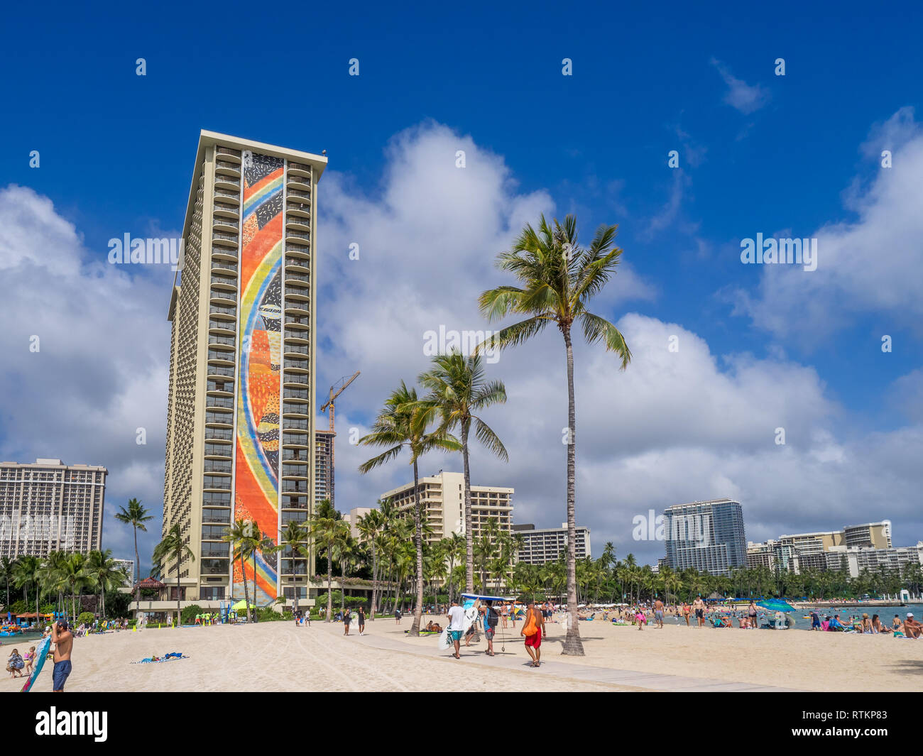 Sun lovers on Waikiki beach at the Hawaiian Hilton on August 7, 2016 in ...