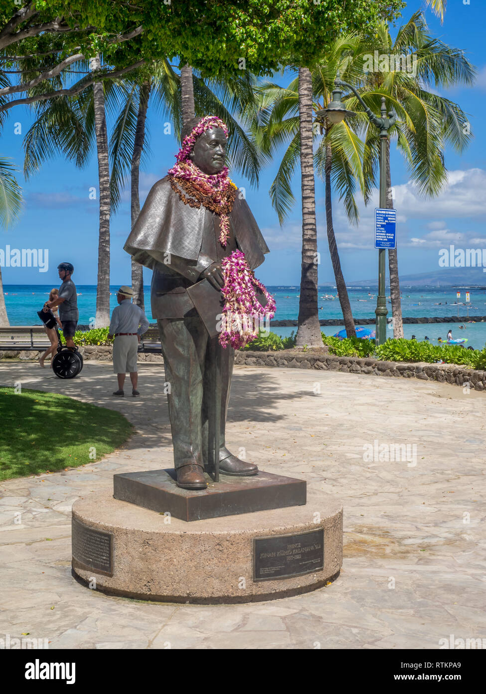 Statue on Waikiki Beach on August 8, 2016 in Honolulu.Statue is covered ...
