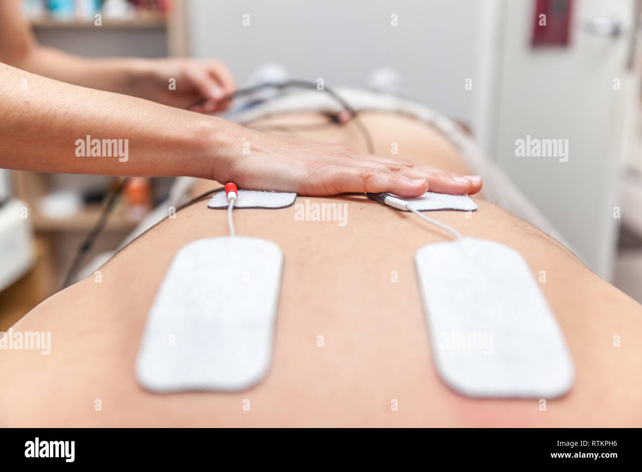 Applying electrodes hi-res stock photography and images - Alamy