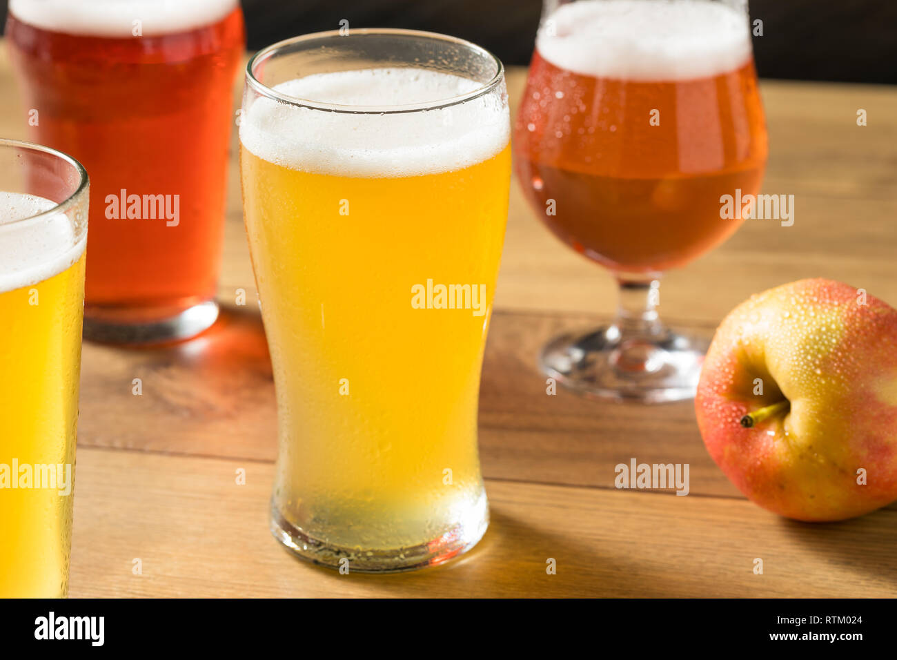 Assorted Alcoholic Hard Cider Flight in Pint Glasses Stock Photo - Alamy