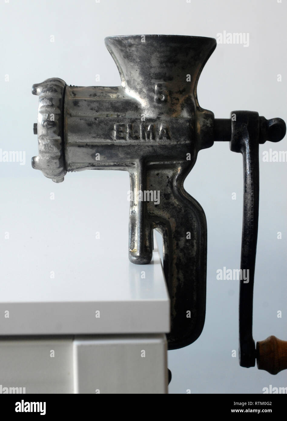 Vintage metal meat grinder Stock Photo - Alamy