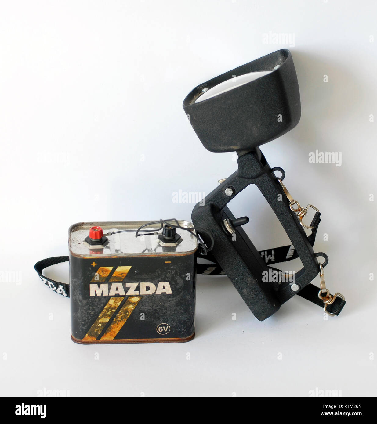 Old battery powered flashlight Mazda brand Stock Photo - Alamy
