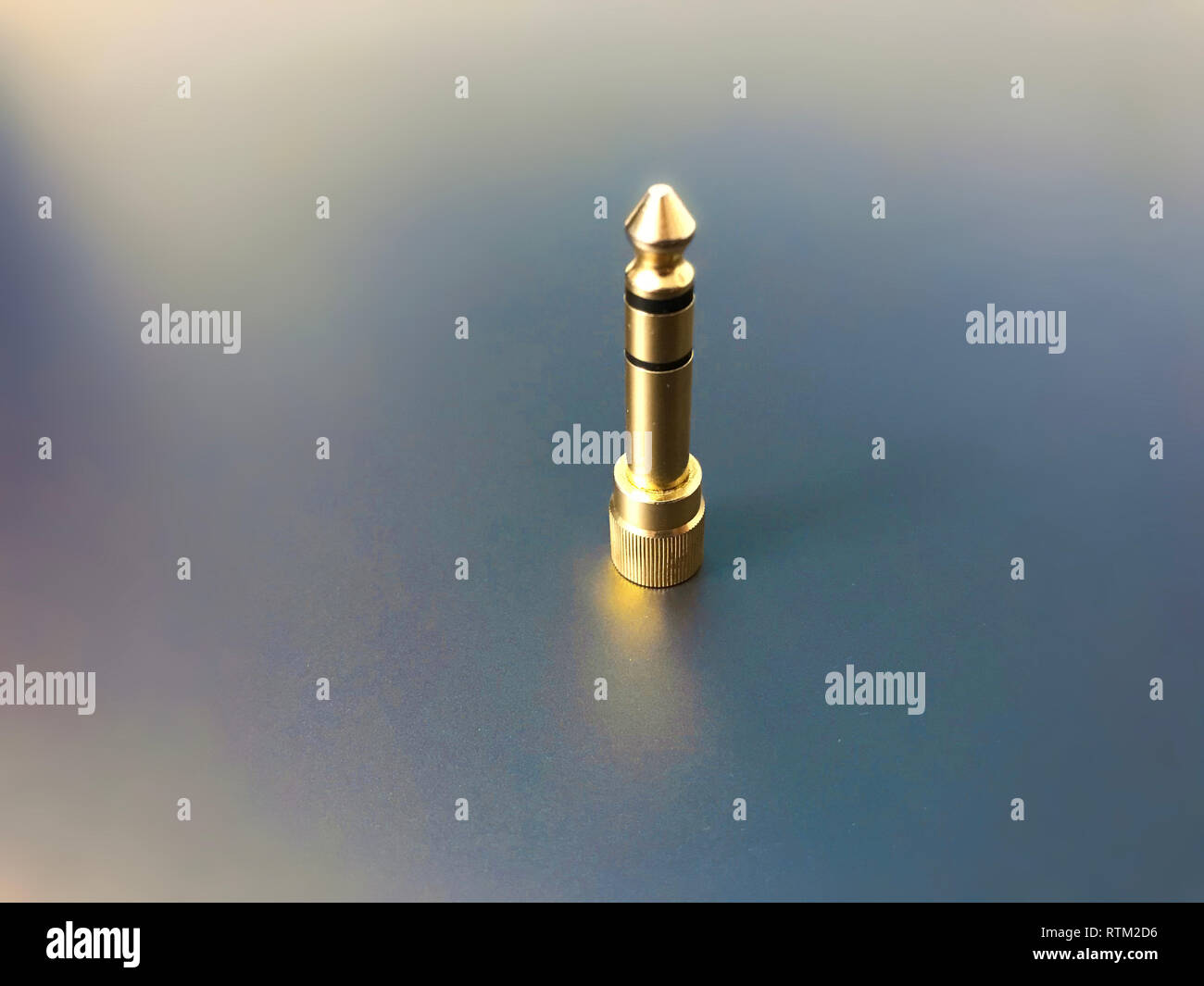 Audio plug jack connector for music on blue background Stock Photo - Alamy