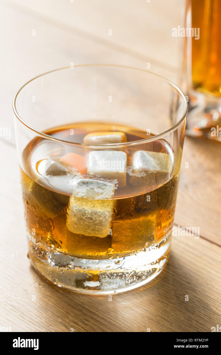 Dark Amber Bourbon with Whiskey Stones Ready to Drink Stock Photo - Alamy