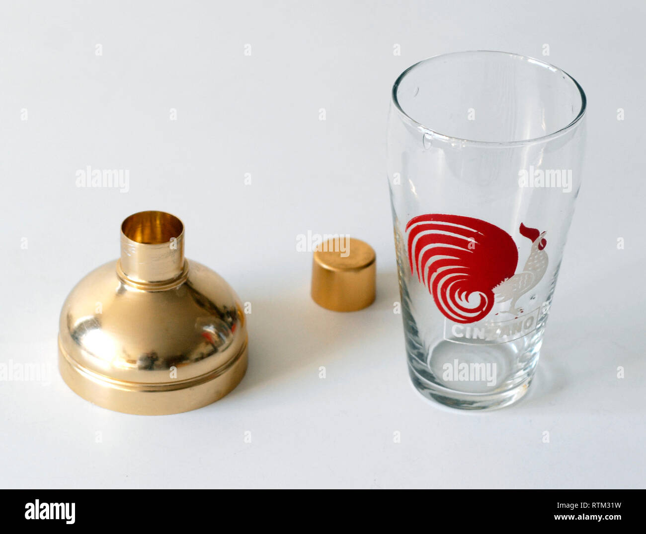 Glass, cocktail shaker advertising vermouth Cinzano Stock Photo - Alamy