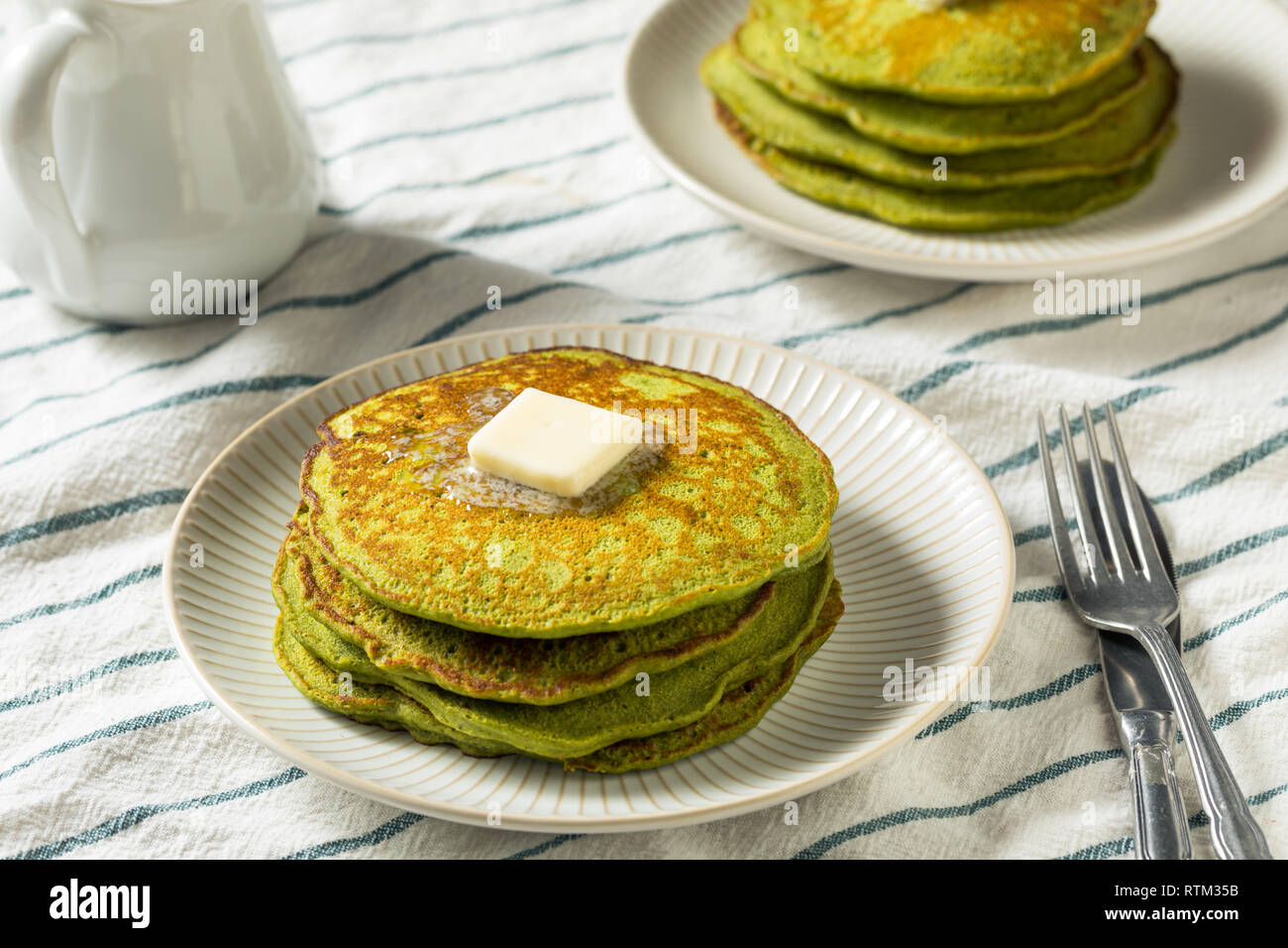 Homemade Matcha Green Tea Pancakes for Breakfast Stock Photo - Alamy