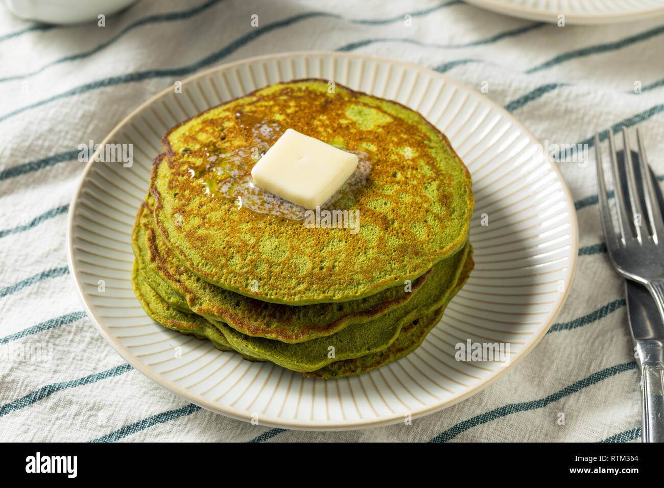Homemade Matcha Green Tea Pancakes for Breakfast Stock Photo - Alamy