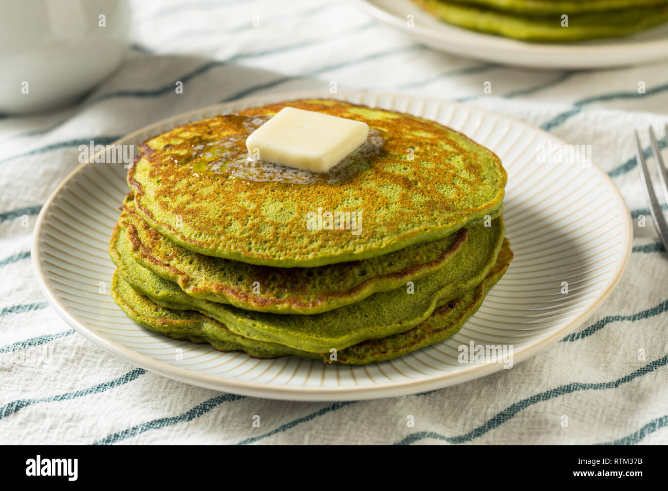 Homemade Matcha Green Tea Pancakes for Breakfast Stock Photo - Alamy