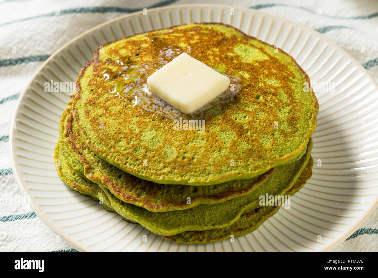 Homemade Matcha Green Tea Pancakes for Breakfast Stock Photo - Alamy