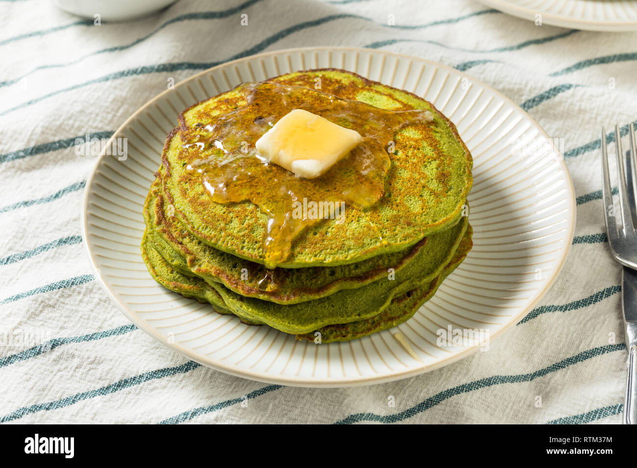 Homemade Matcha Green Tea Pancakes for Breakfast Stock Photo - Alamy