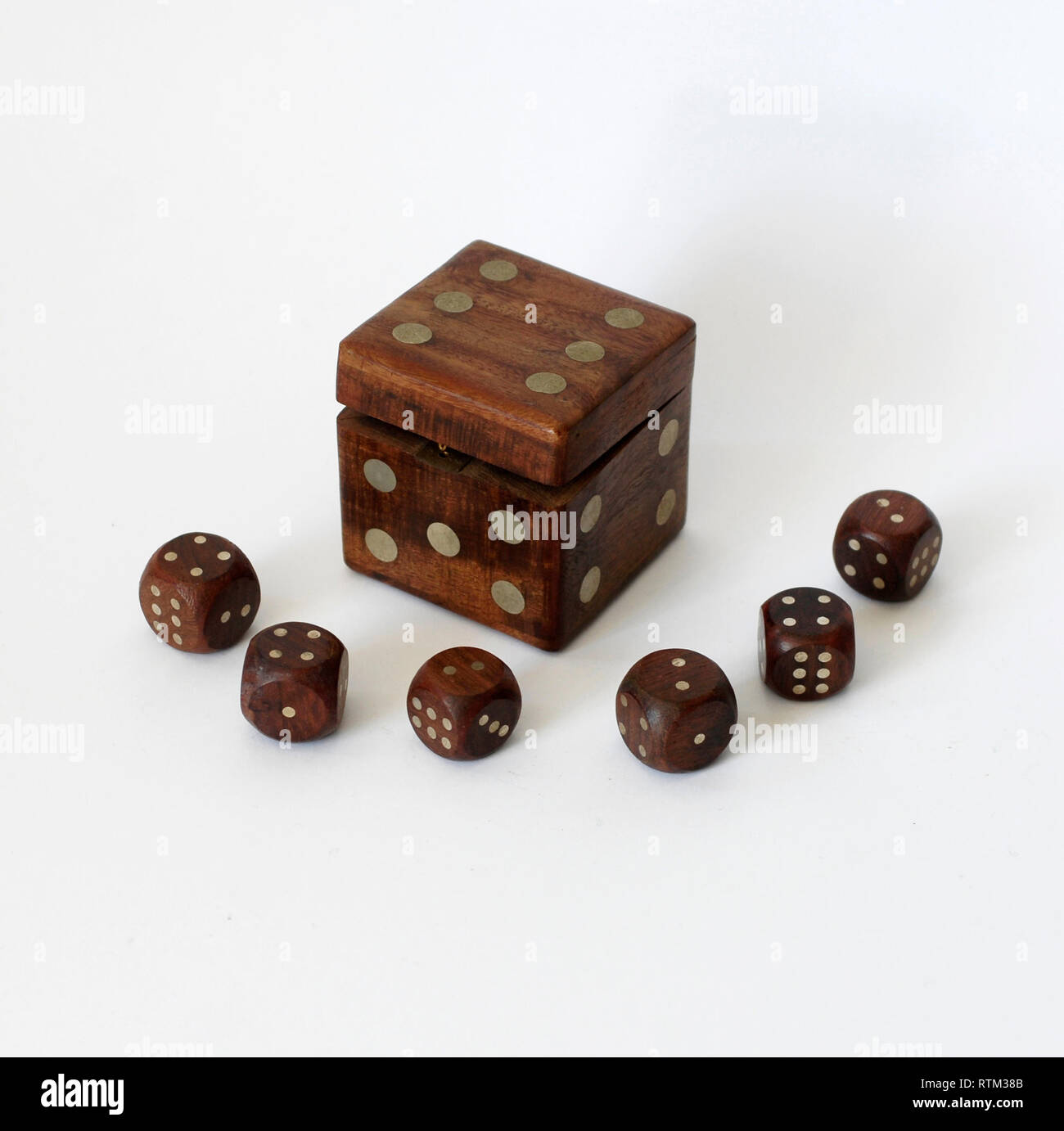 Vintage wooden cube with dice for board games Stock Photo - Alamy