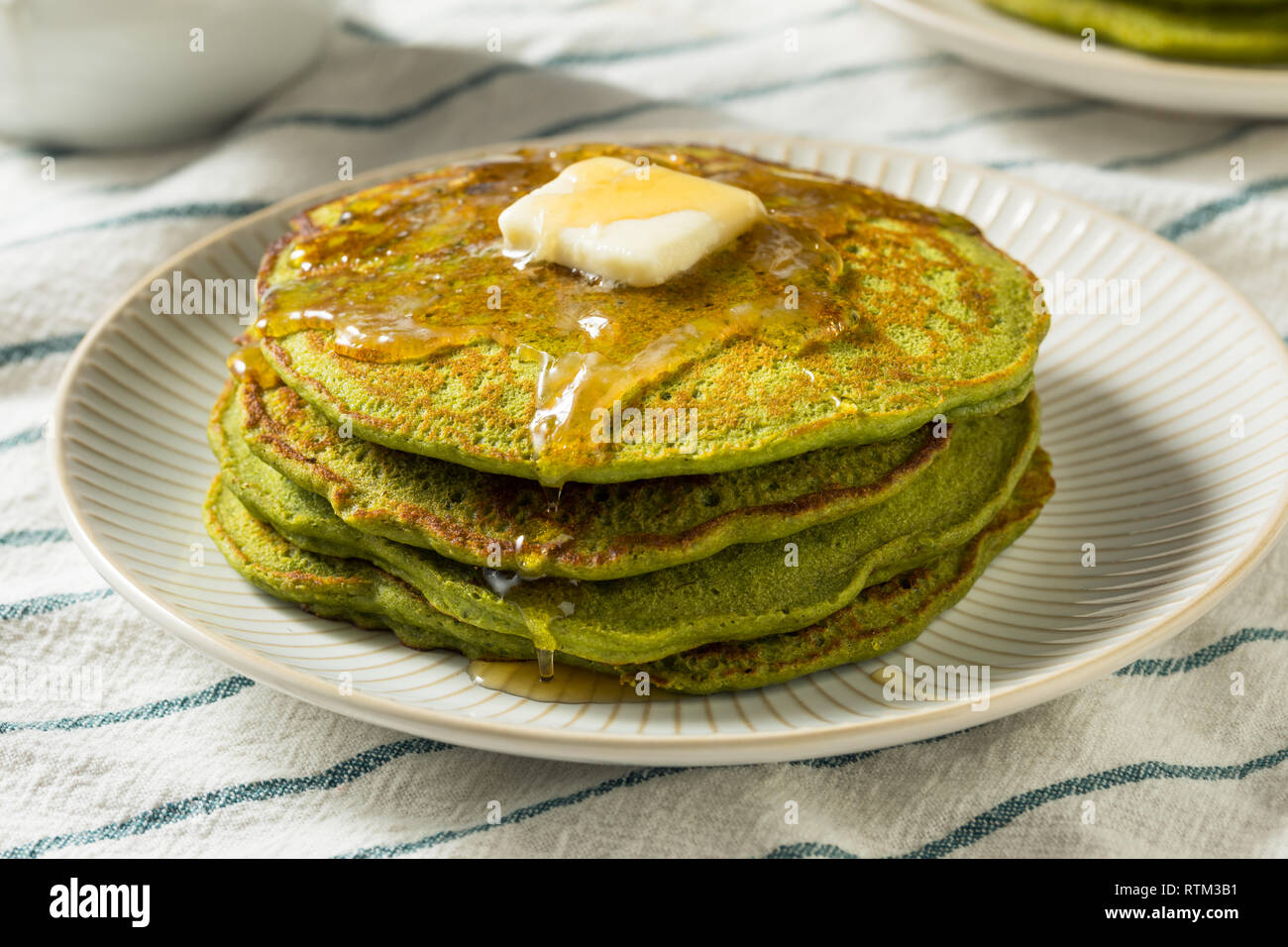 Homemade Matcha Green Tea Pancakes for Breakfast Stock Photo - Alamy