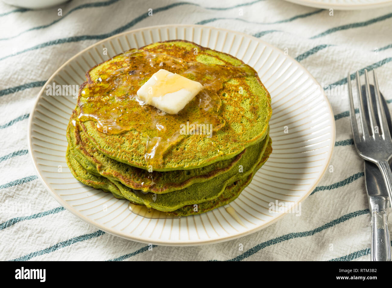 Homemade Matcha Green Tea Pancakes for Breakfast Stock Photo - Alamy