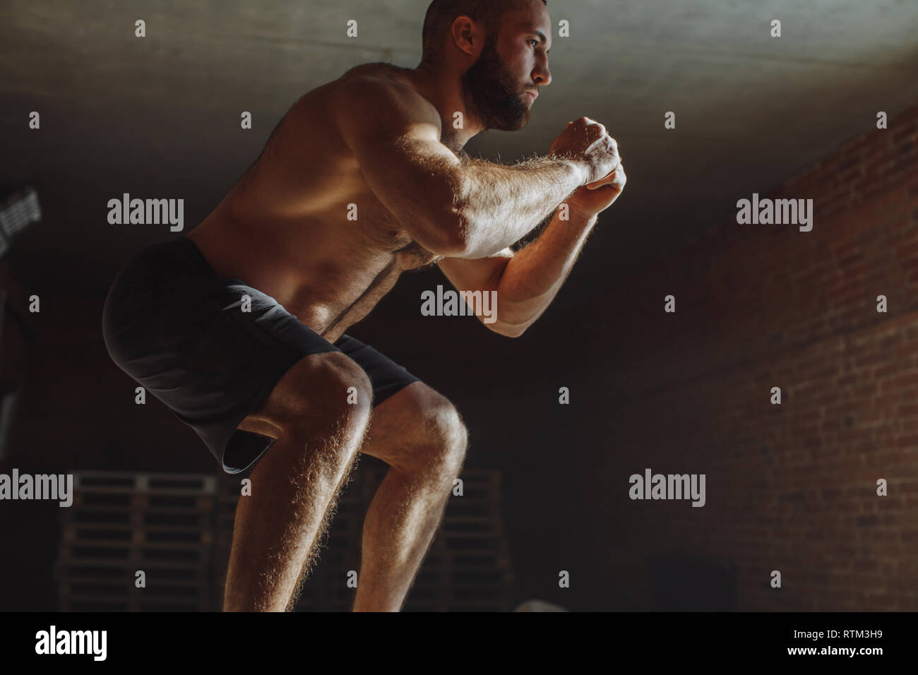 Box jump plyo exercise - young caucasian man doing functional workout ...