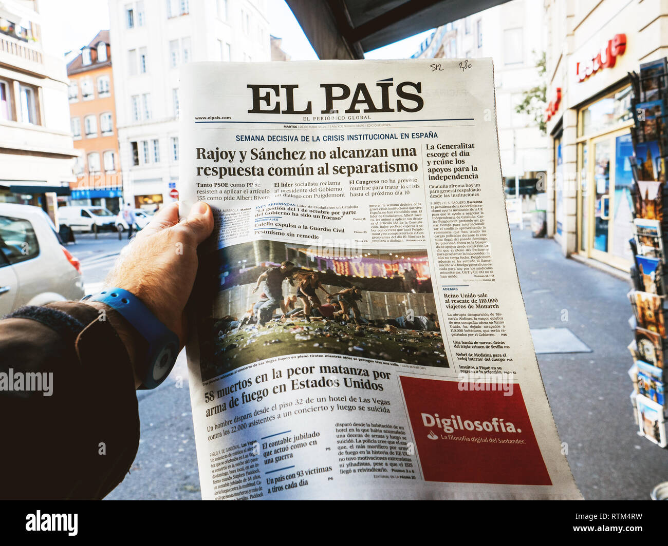 PARIS, FRANCE - OCT 3, 2017: Man buying Spanish El Pais newspaper with ...