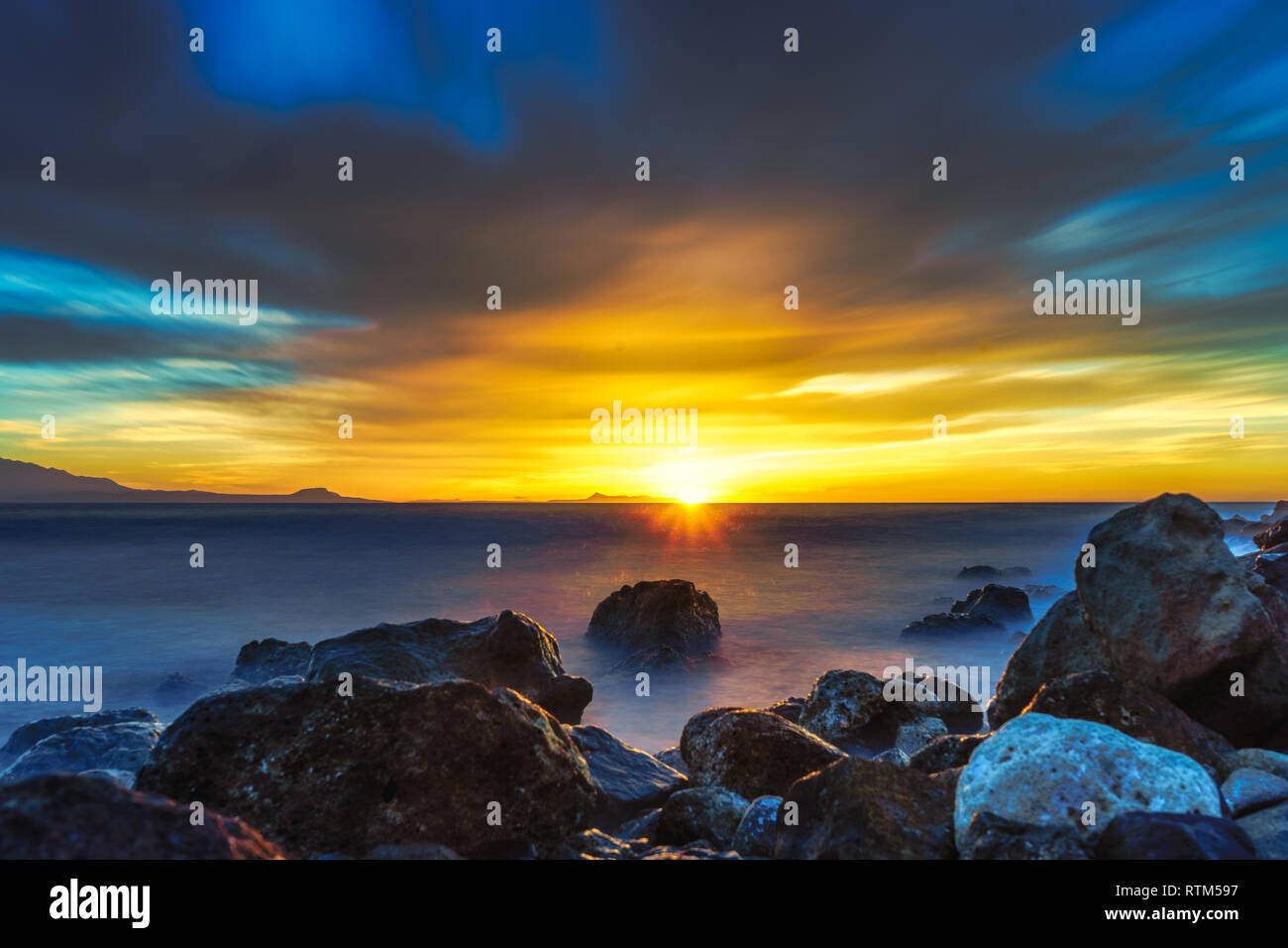 Blue sea waves sunset storm hi-res stock photography and images - Alamy