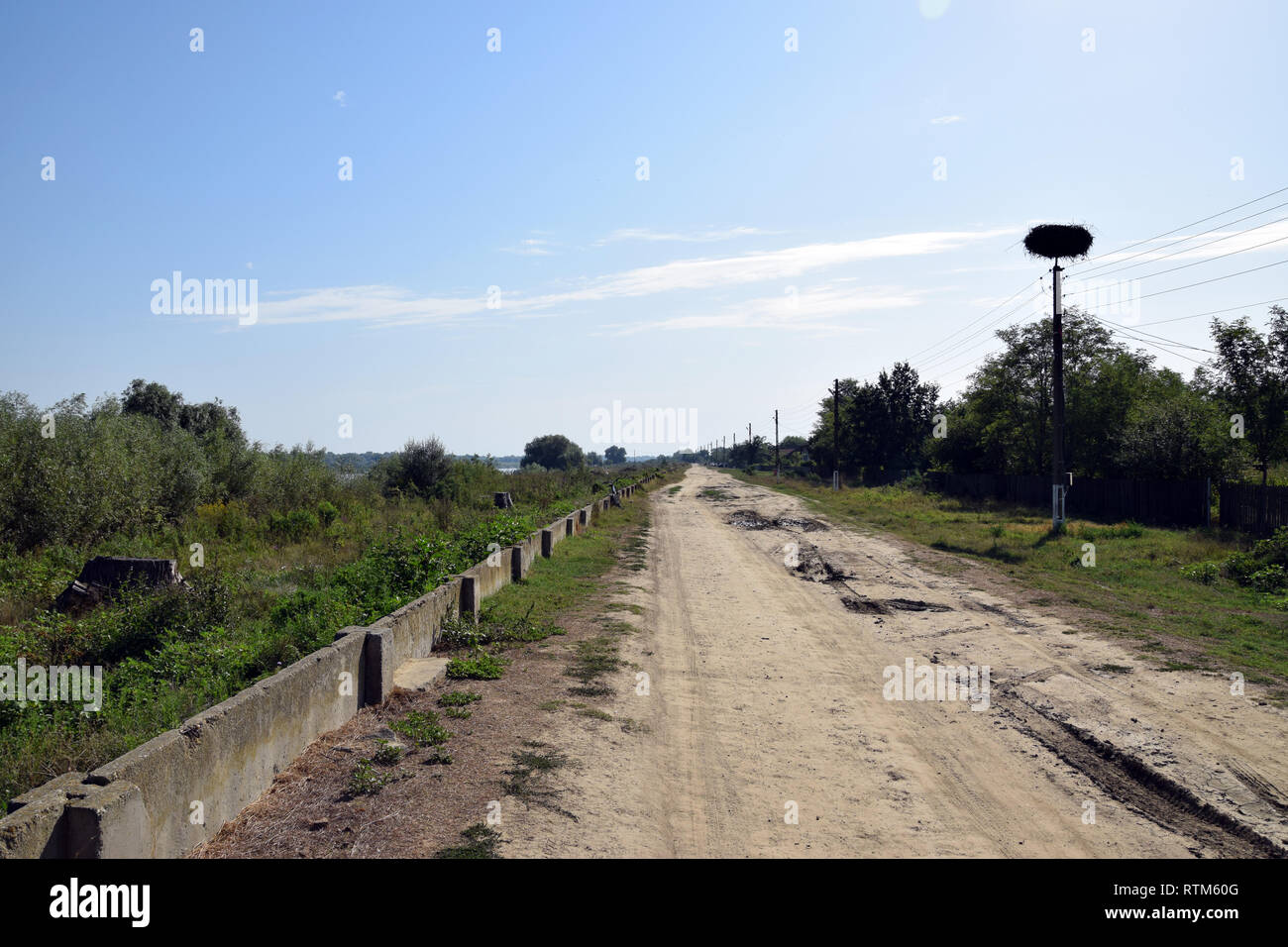 Stork nest. Country road in Gorgova village. Danube Delta, Romania ...