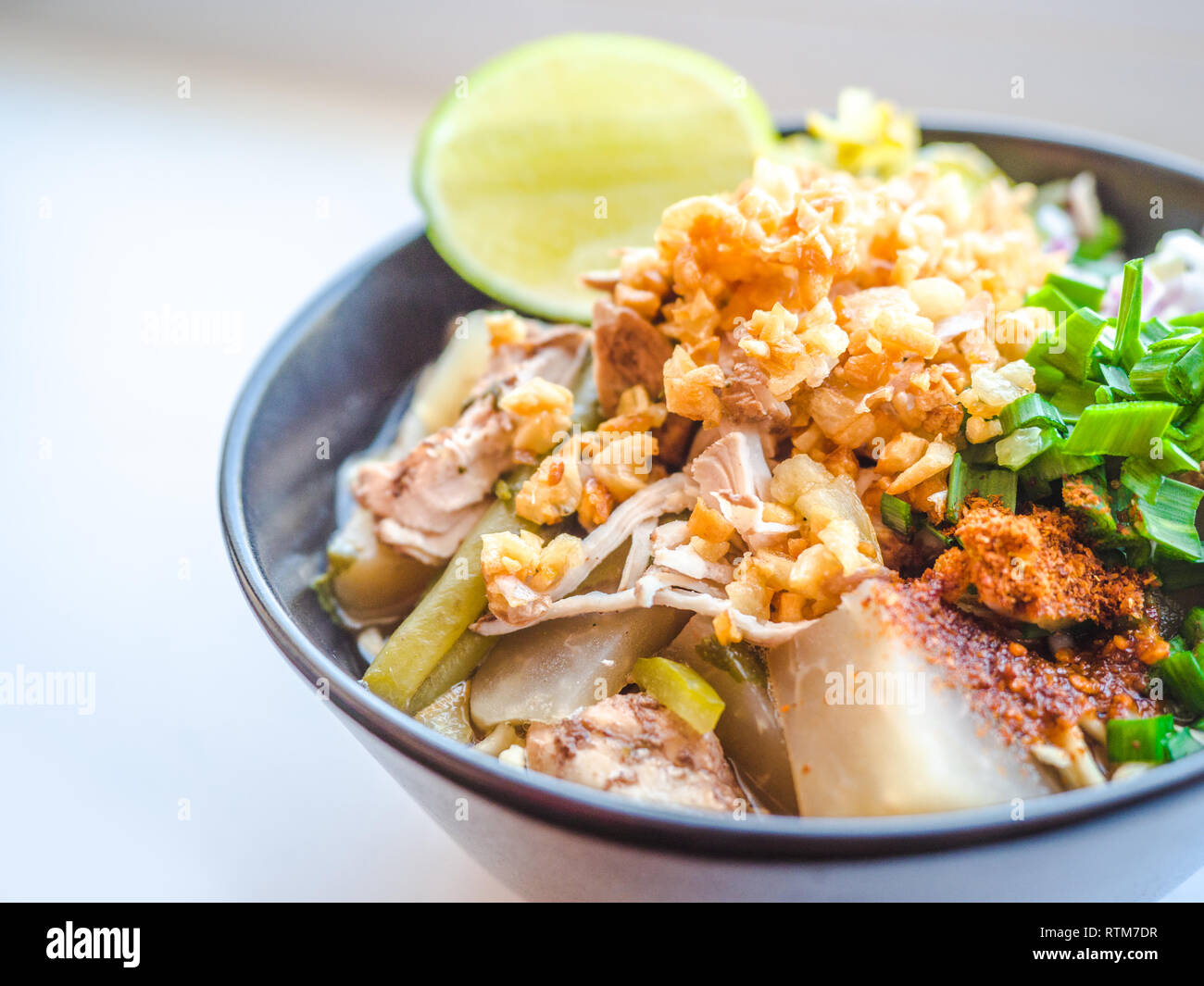 Shred chicken instant noodles with deep fried garlic. chili powder ...