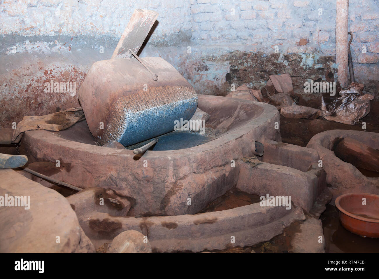 Giant mill or mortar for the extraction of gold Stock Photo - Alamy