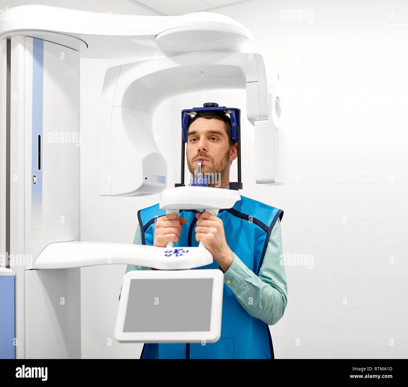 patient having x-ray scanning at dental clinic Stock Photo - Alamy
